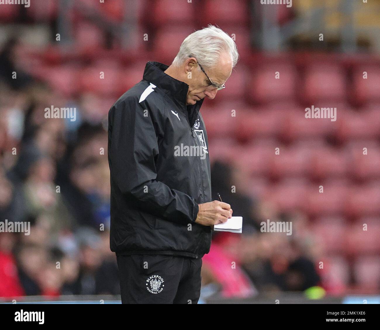 Mick McCarthy Manager of Blackpool takes notes during the Emirates FA ...