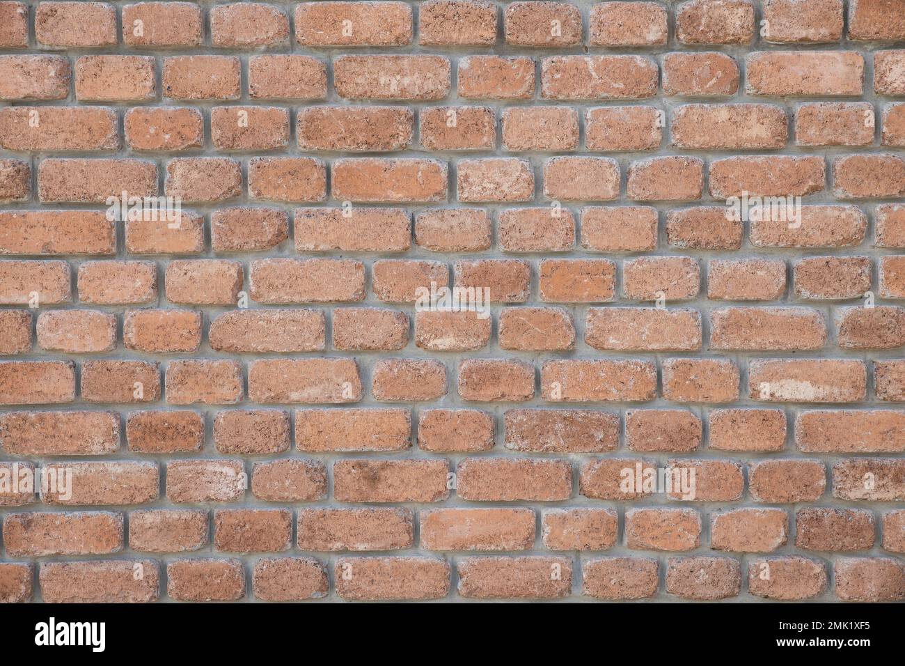 brown wall made of brick with rounded edges Stock Photo - Alamy