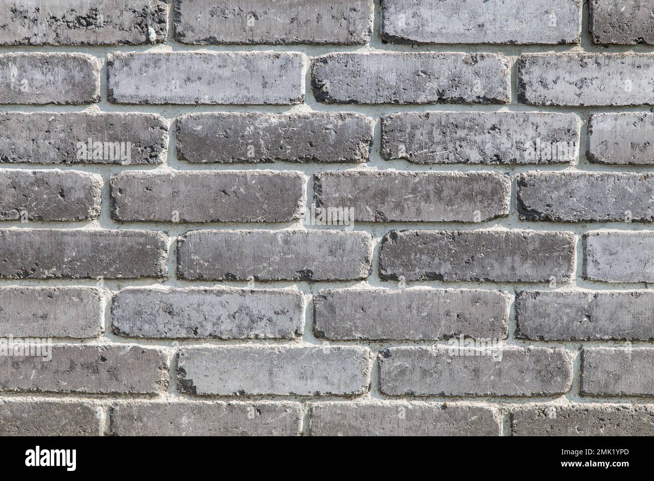 dark wall made of ash color bricks Stock Photo - Alamy