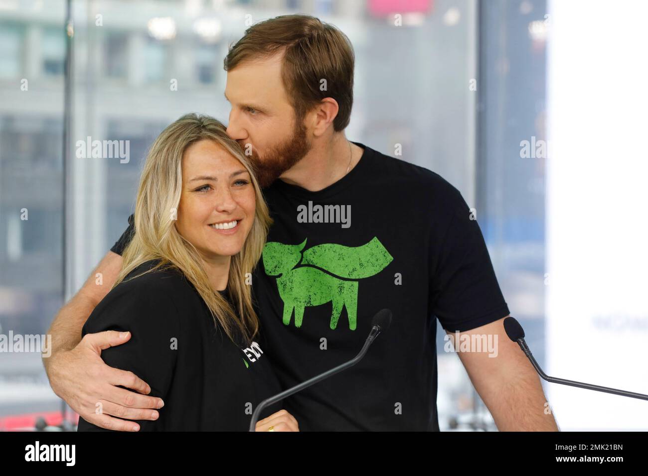 Ethan Brown, CEO of Beyond Meat, kisses his wife Tracy as they attend the Opening Bell ceremony ...