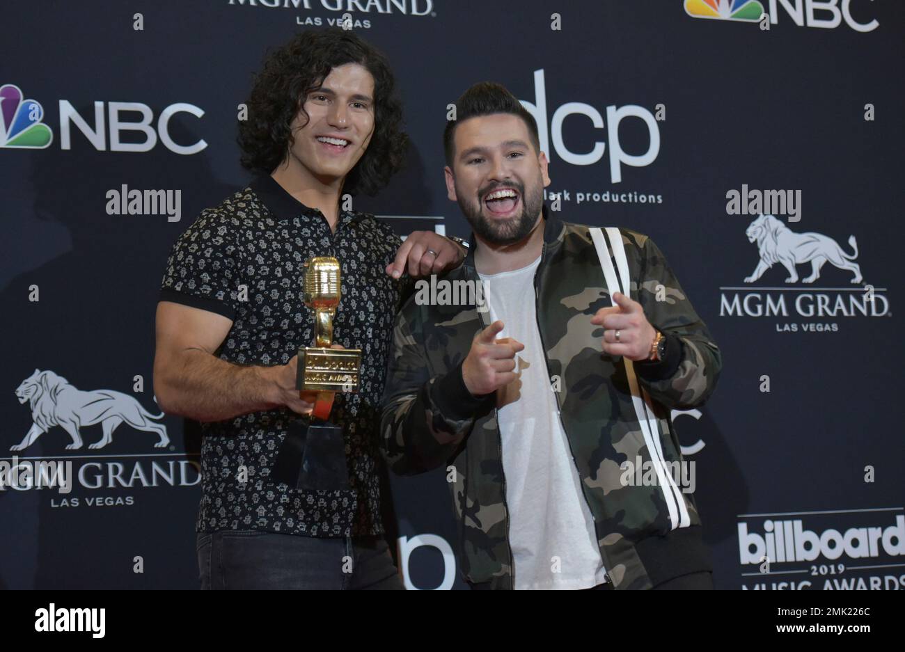 Dan Smyers, left, and Shay Mooney, of Dan + Shay, pose in the press ...