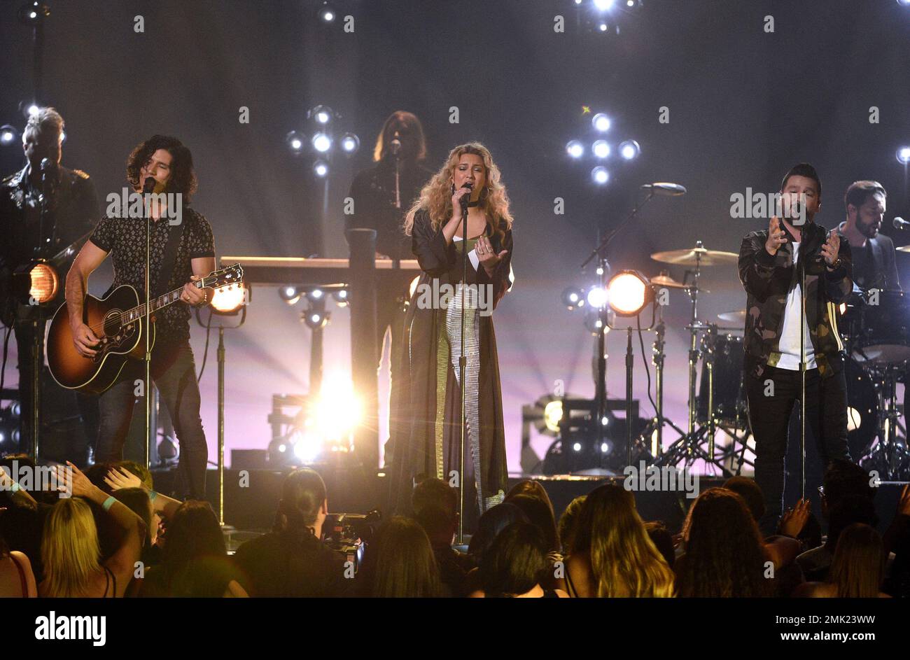 Dan Smyers, from left, Tori Kelly and Shay Mooney perform "Speechless" at the Billboard Music ...