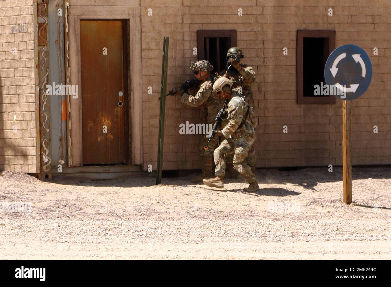 U.S. Army Soldiers from 11th Armored Cavalry Regiment prepare to enter ...