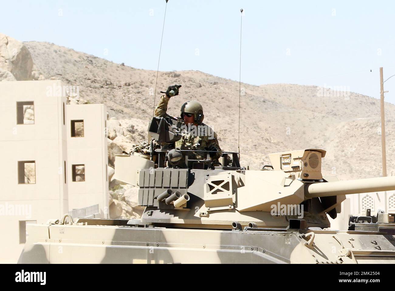 U.S. Army Soldier from 11th Armored Cavalry Regiment throws a smoke ...