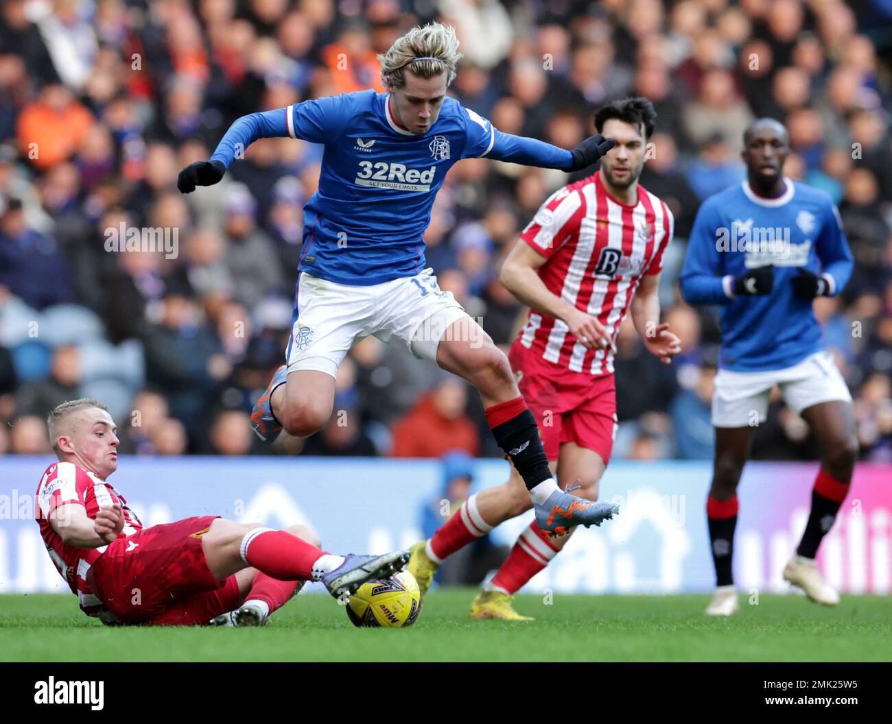 Rangers' Todd Cantwell jumps clear from St Johnstone's Cameron ...