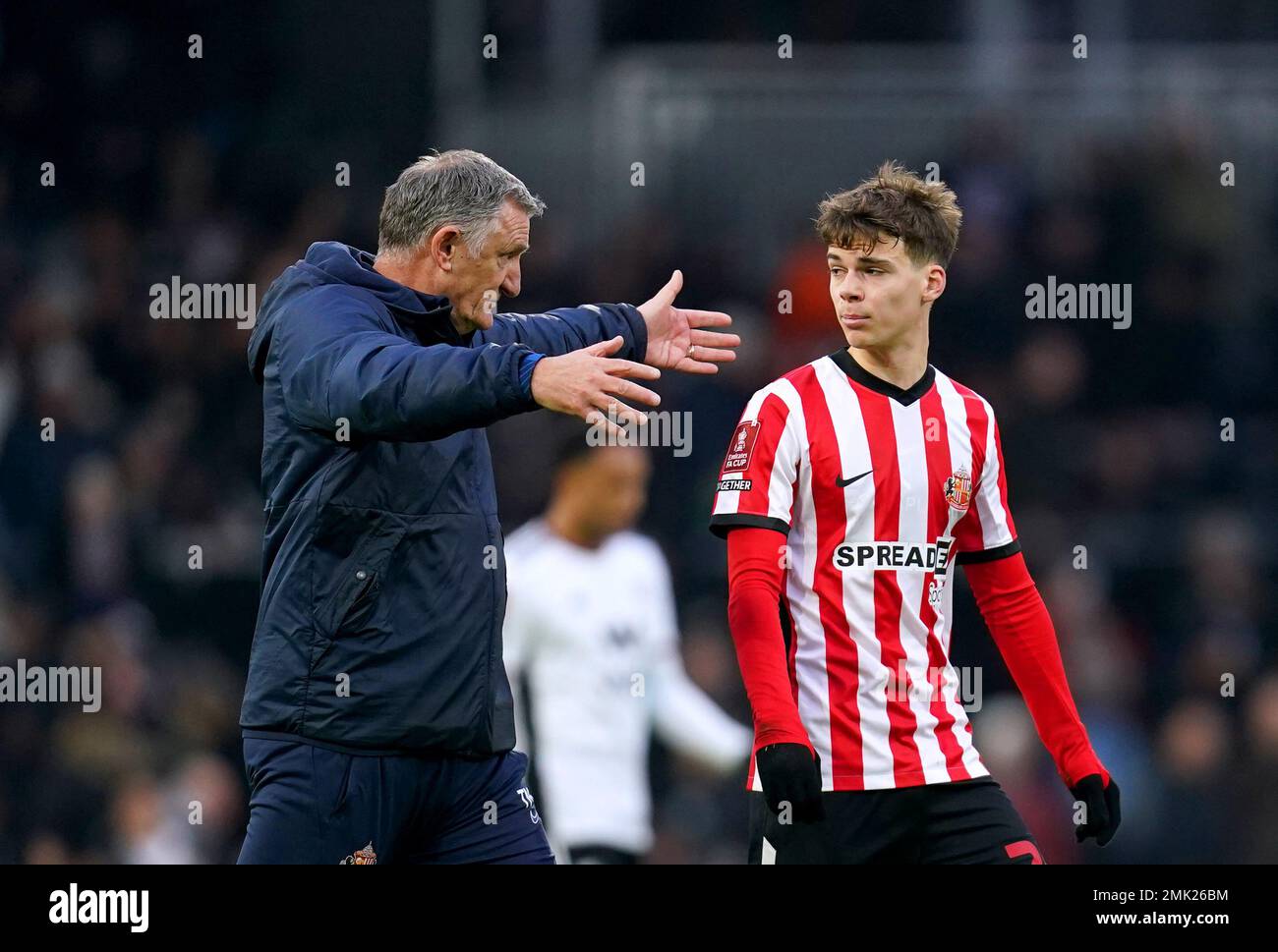 Sunderland manager Tony Mowbray (left) speaks to Edouard Michut at half ...