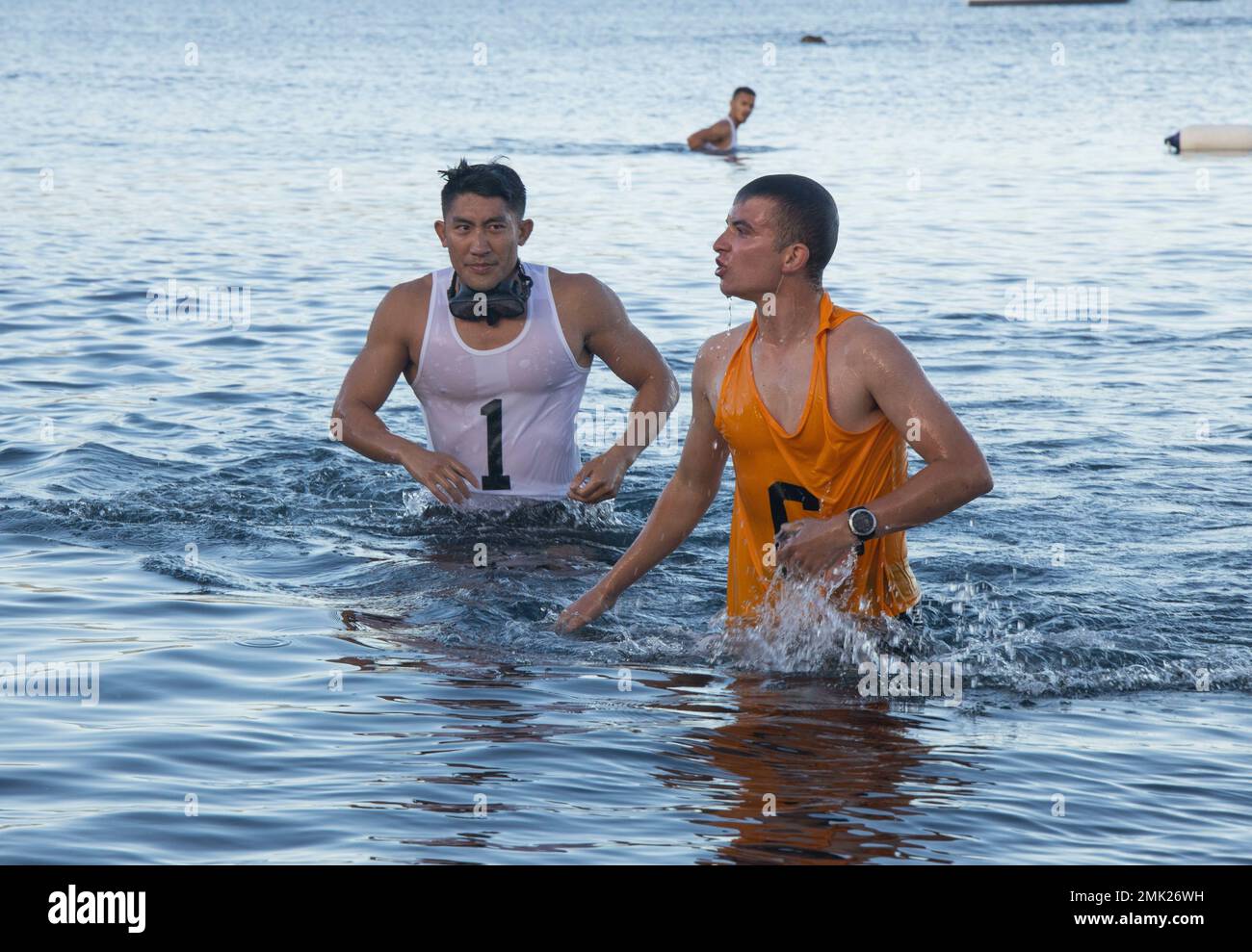 U.S. Marine Corps Capt. Daniel W. Chow, left, company commander ...