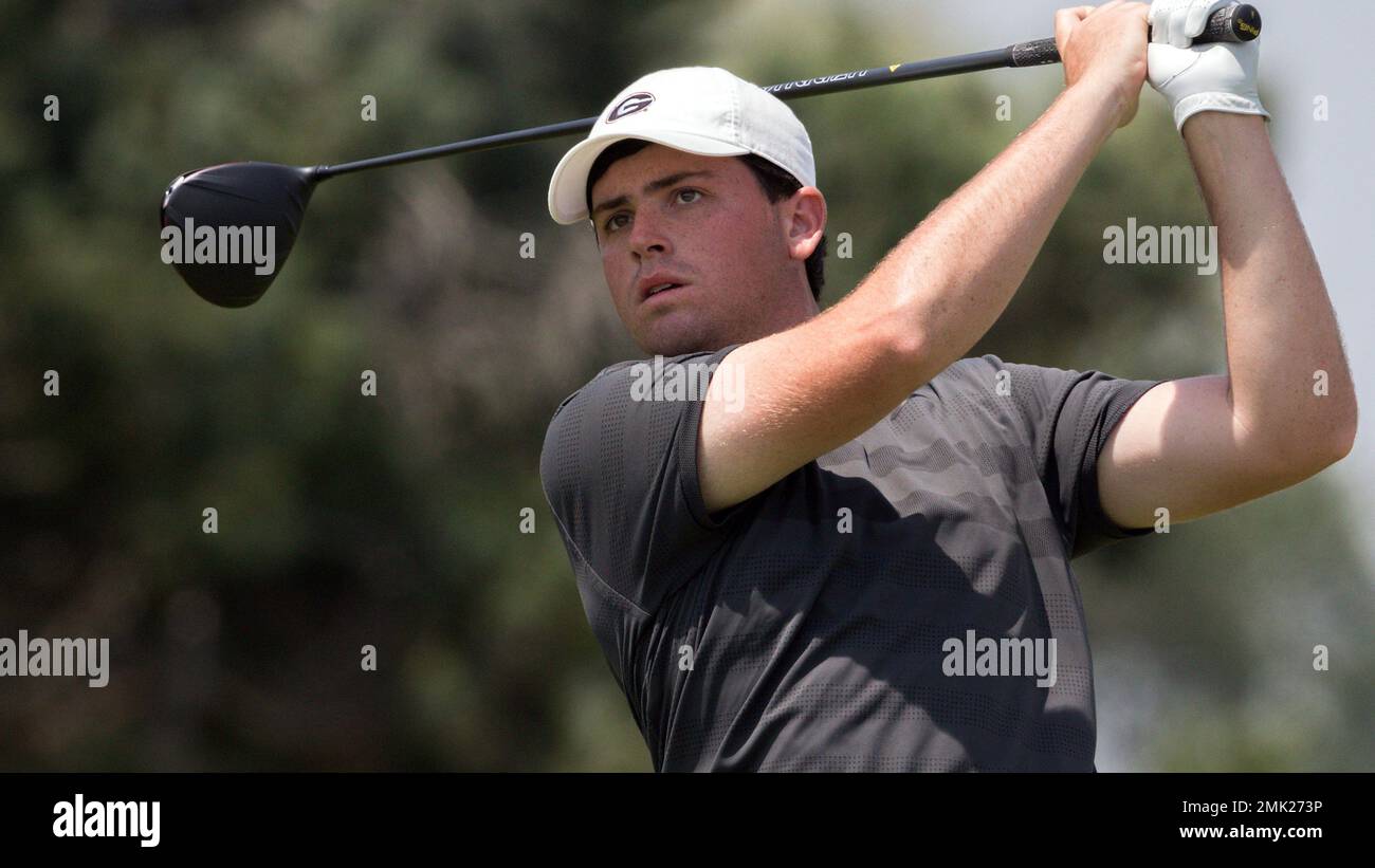 Georgia's Spencer Ralston watches his drive off the 18th tee during the ...