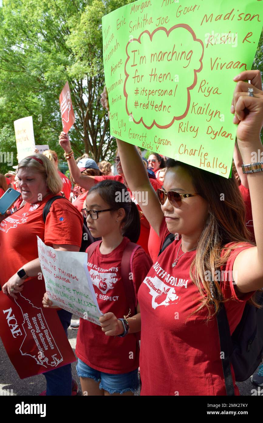 Fifth grade elementary school teacher Shirley Pyon, 41, marches in ...