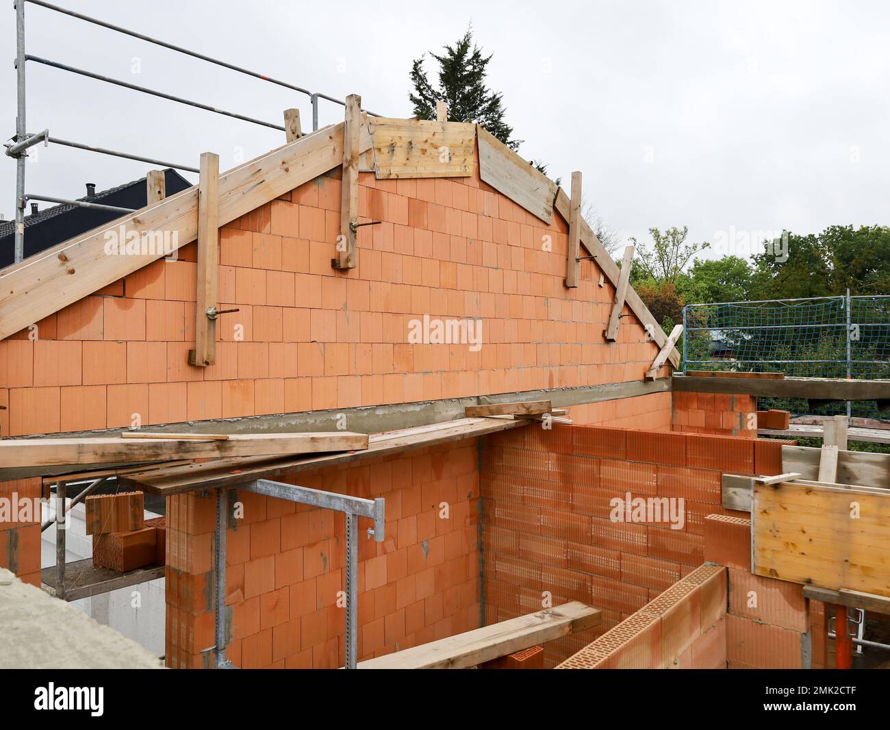 bungle in building a house Stock Photo - Alamy