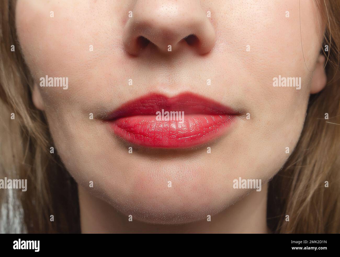 Part of woman's face with lips close-up. Asymmetry. Cosmetology Stock ...