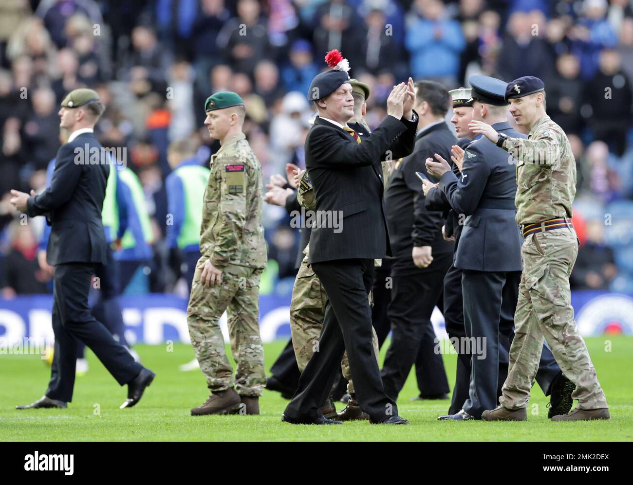 Members of the armed forces on the pitch at half-time during the cinch ...