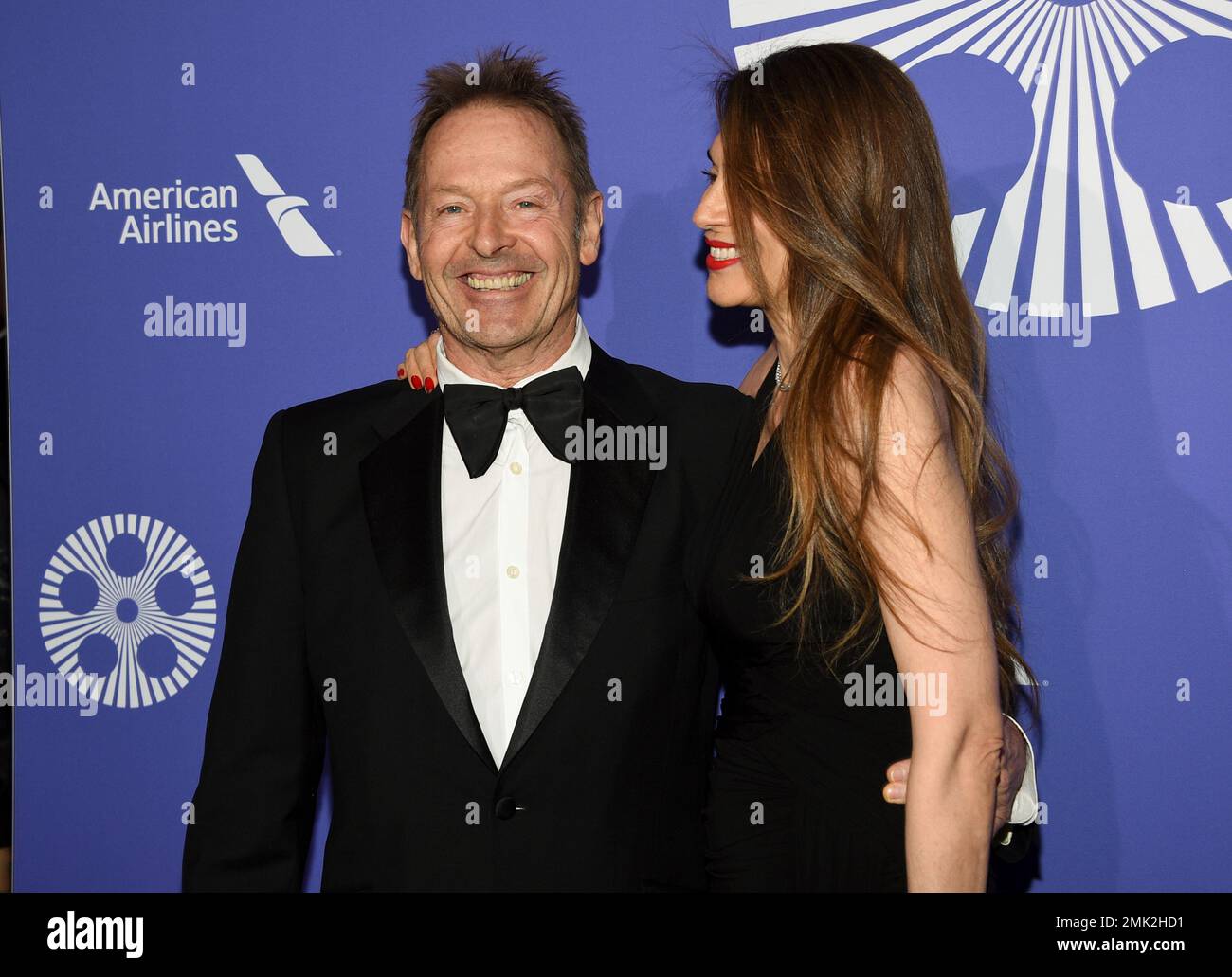 Musician Simon Kirke, left, and wife Maria Angelica attend the Film ...