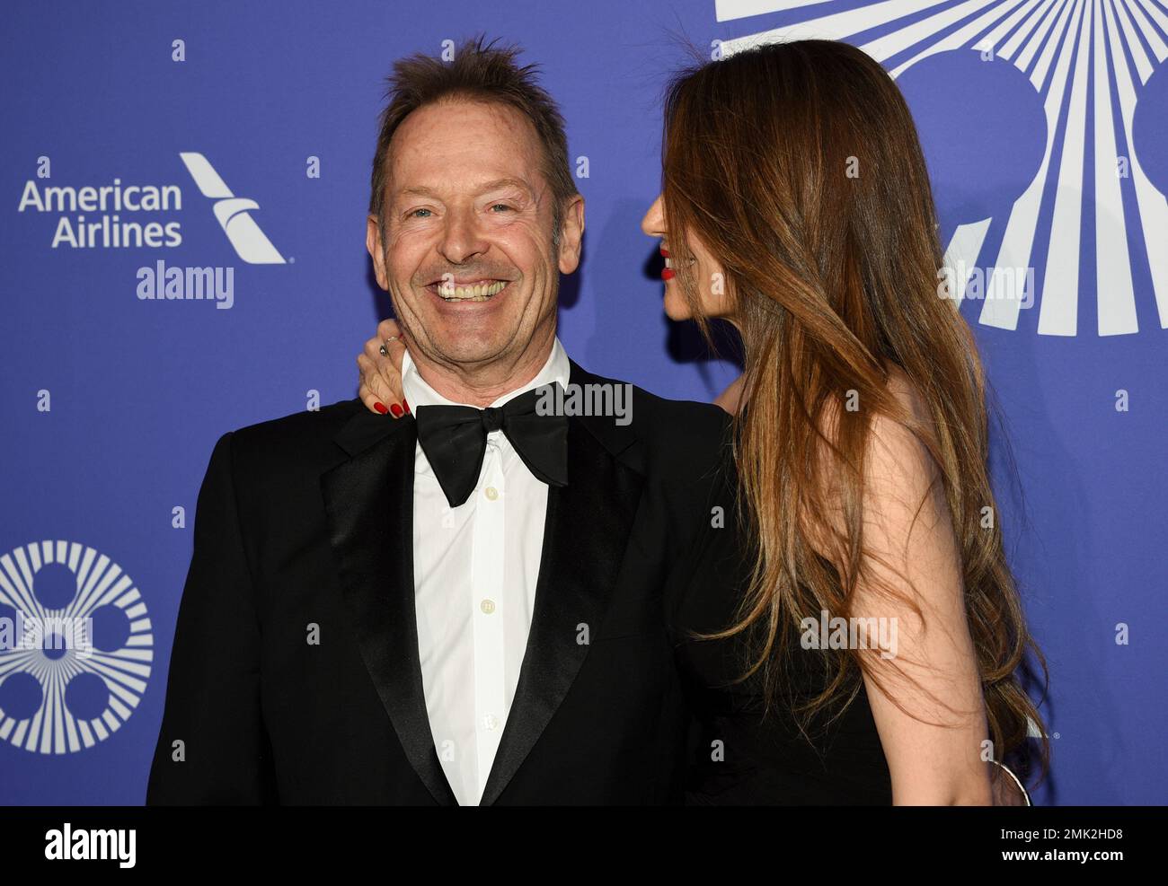 Musician Simon Kirke, left, and wife Maria Angelica attend the Film ...