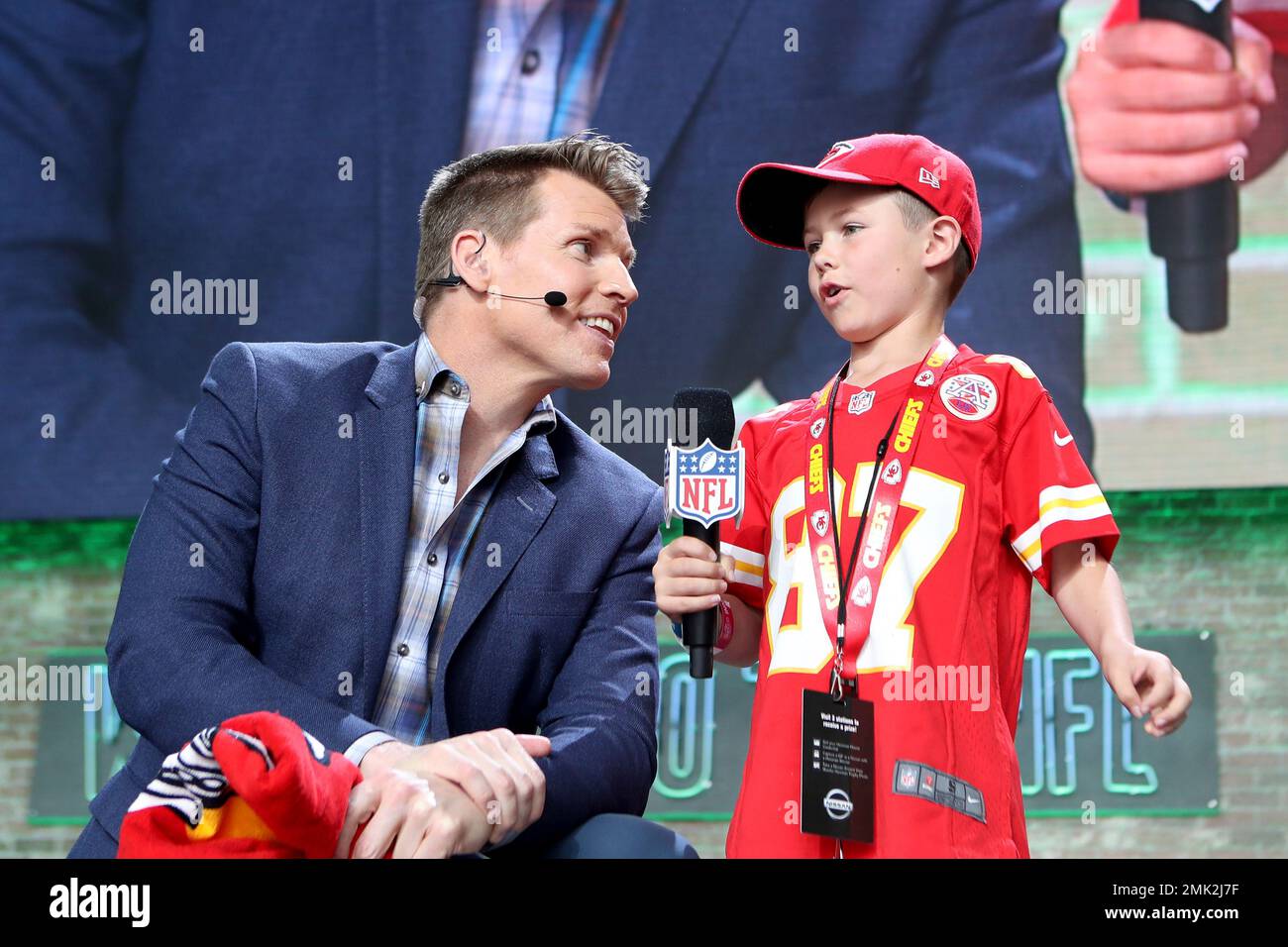 NFL RedZone host Scott Hanson is seen with a young Kansas City Chiefs ...