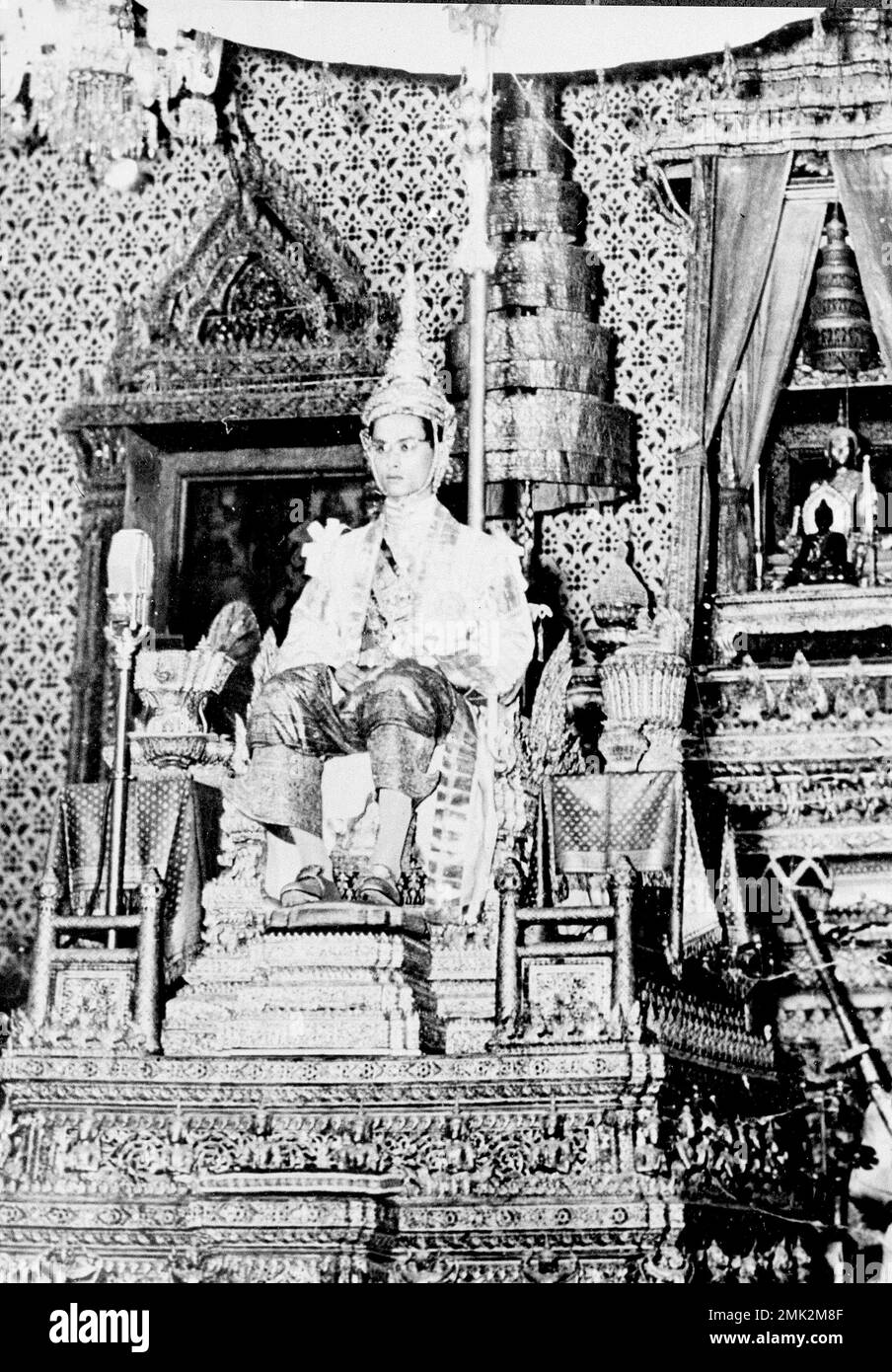 Thailand's new king, Bhumibol Adulyadej, wears the nine-tiered crown as ...