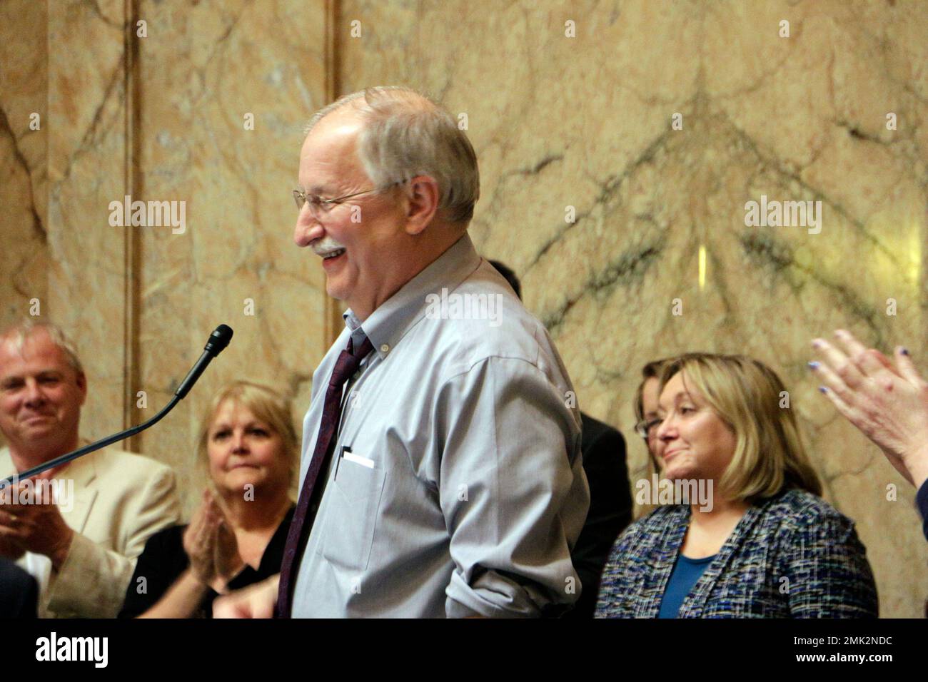 House Speaker Frank Chopp smiles following passage of a resolution ...