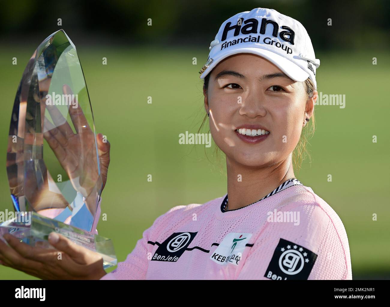 Minjee Lee, of Australia, poses with her trophy after winning the Hugel ...