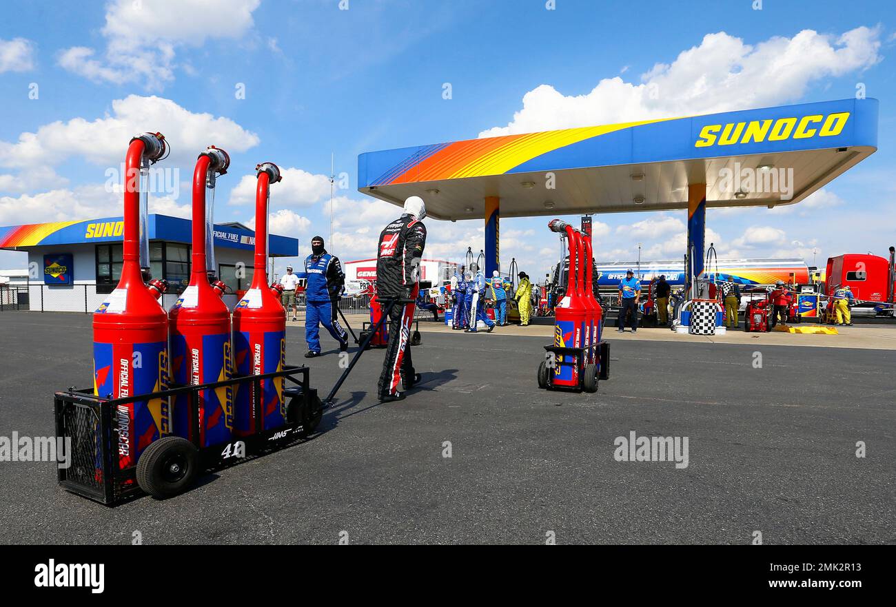 Crews head to the gas pumps to refill tanks during a NASCAR Cup Series ...