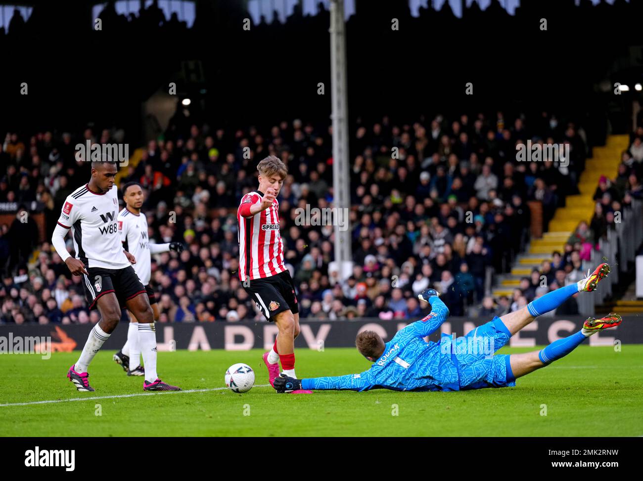 Fulham goalkeeper Marek Rodak saves a shot from Sunderland's Jack ...