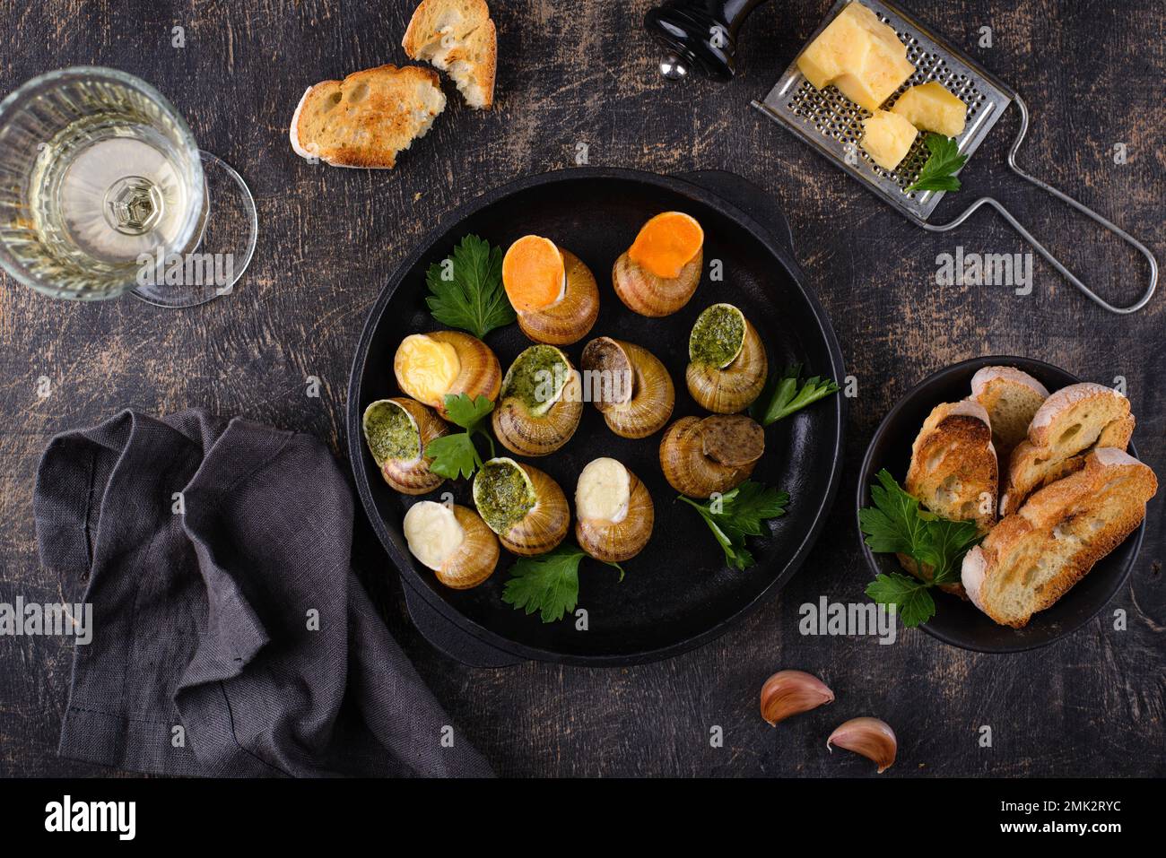 Baked snails Escargot with bread Stock Photo - Alamy