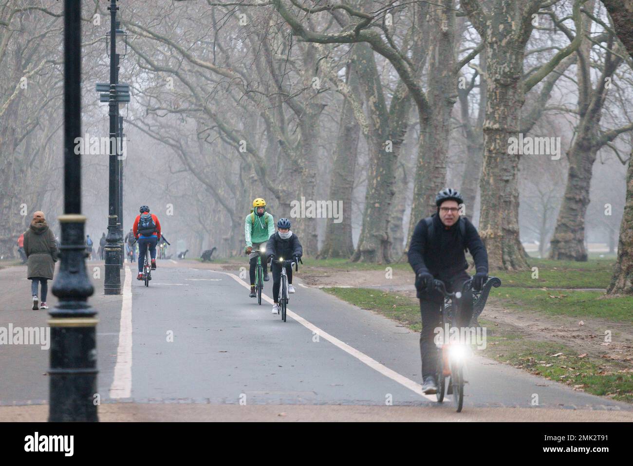 Heavy fog descends London this morning. Pictured: Cyclists cycle ...
