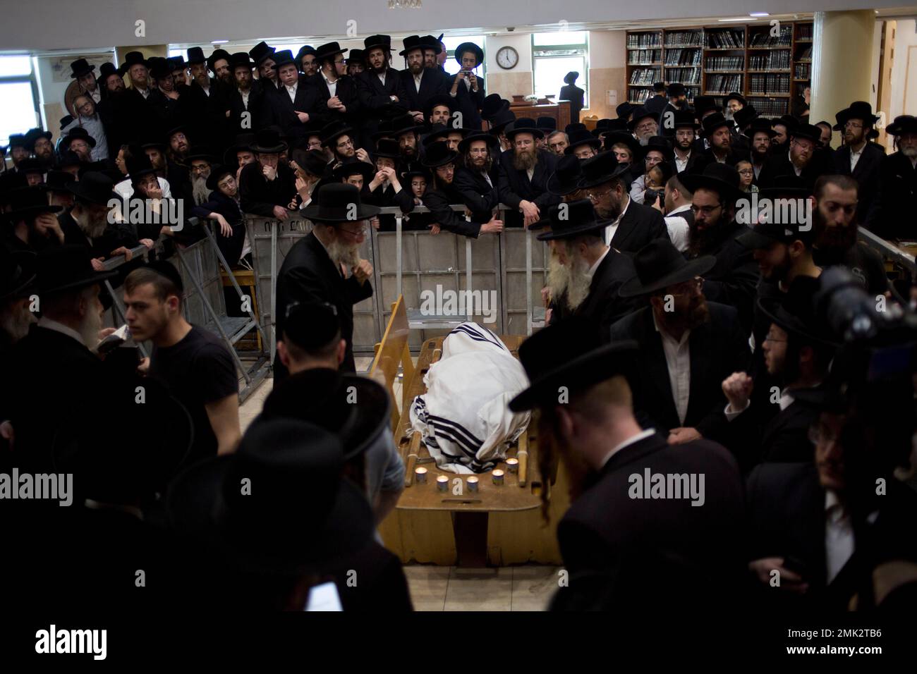 Ultra-Orthodox Jews mourn next to the body of Rabbi of the Kaliv ...