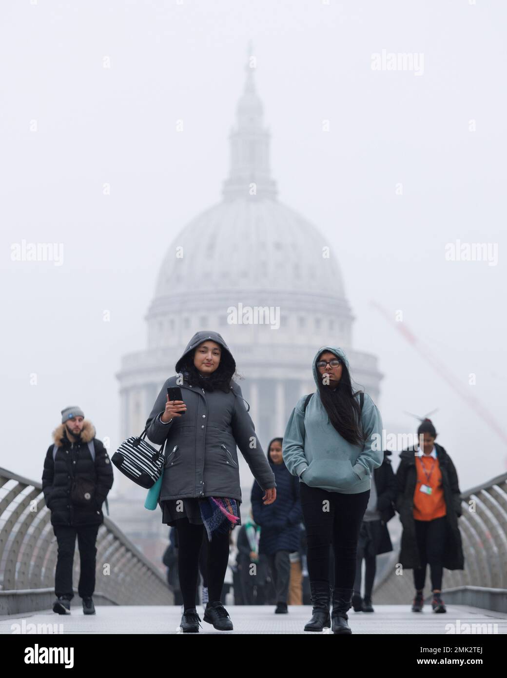 Heavy fog descends London this morning. Pictured: Commuters brace the ...