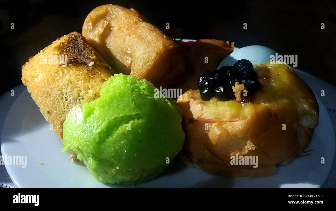 Close up photo of some snacks and bread in Indonesia Stock Photo - Alamy
