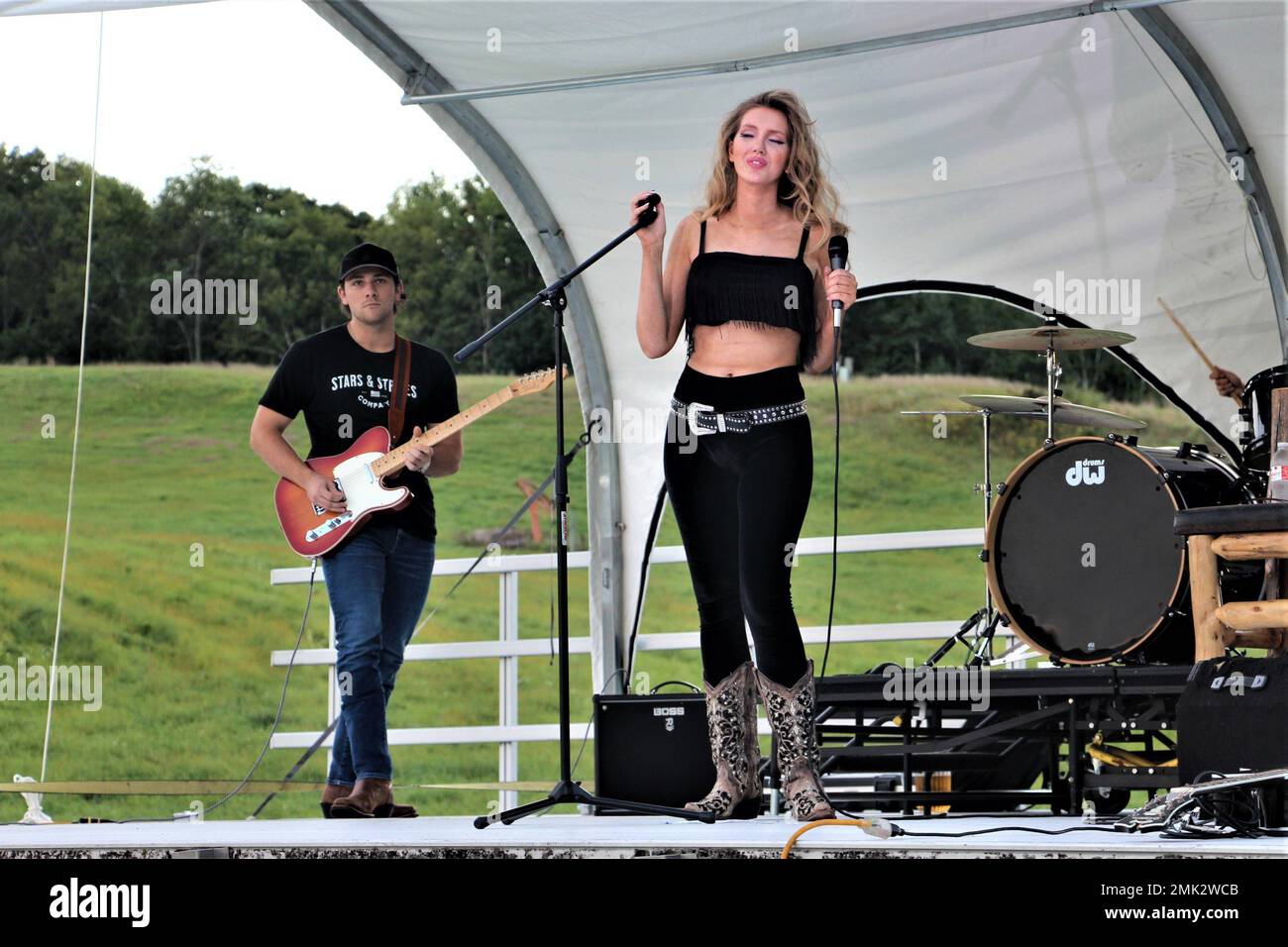 Performer Pearl Clarkin with the country duo/group Wester sings Sept. 3 ...