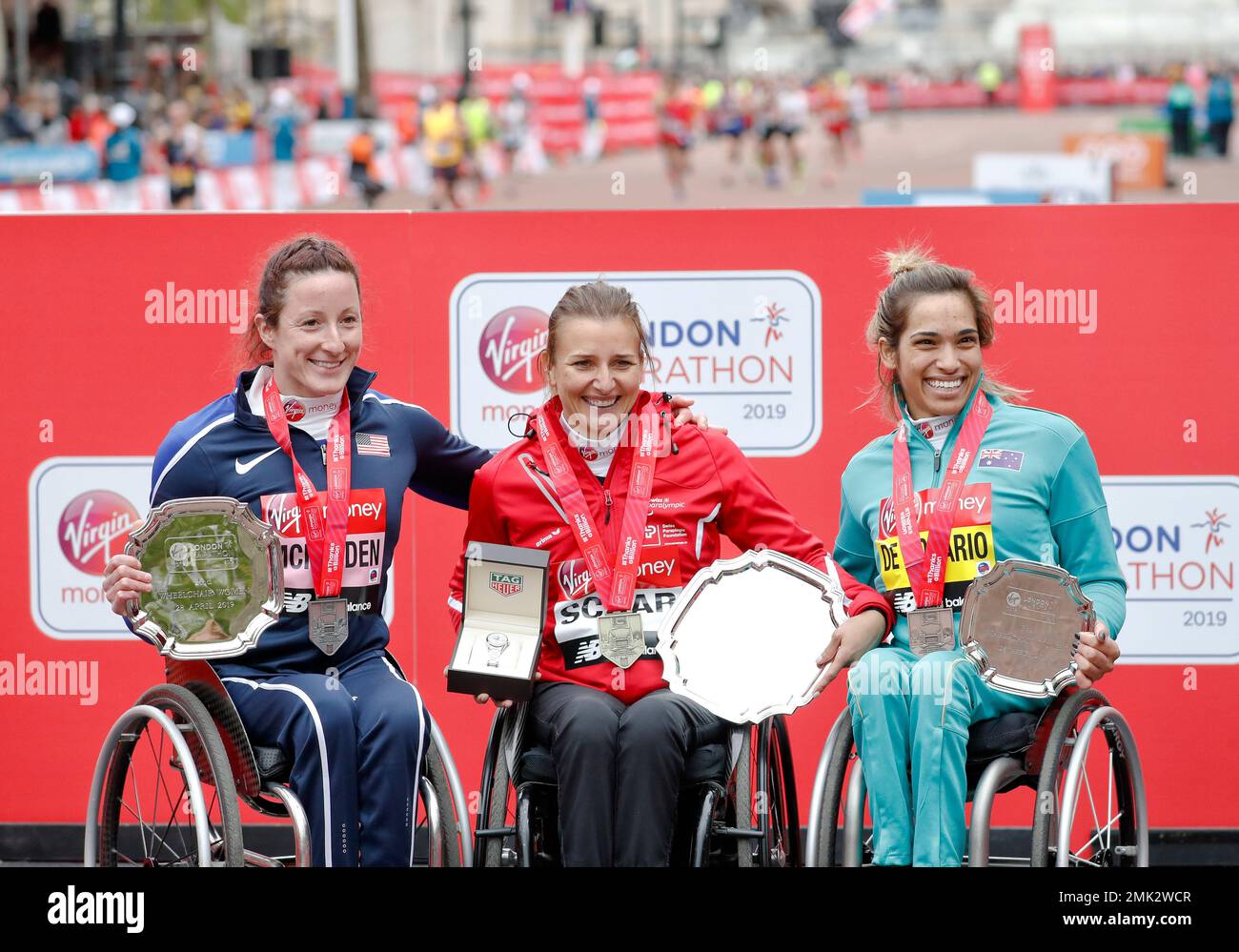 Women's wheelchair race first place winner Switzerland's Manuela Schar ...