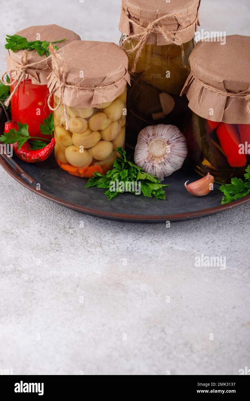 Pickled vegetables in glass jars Stock Photo - Alamy