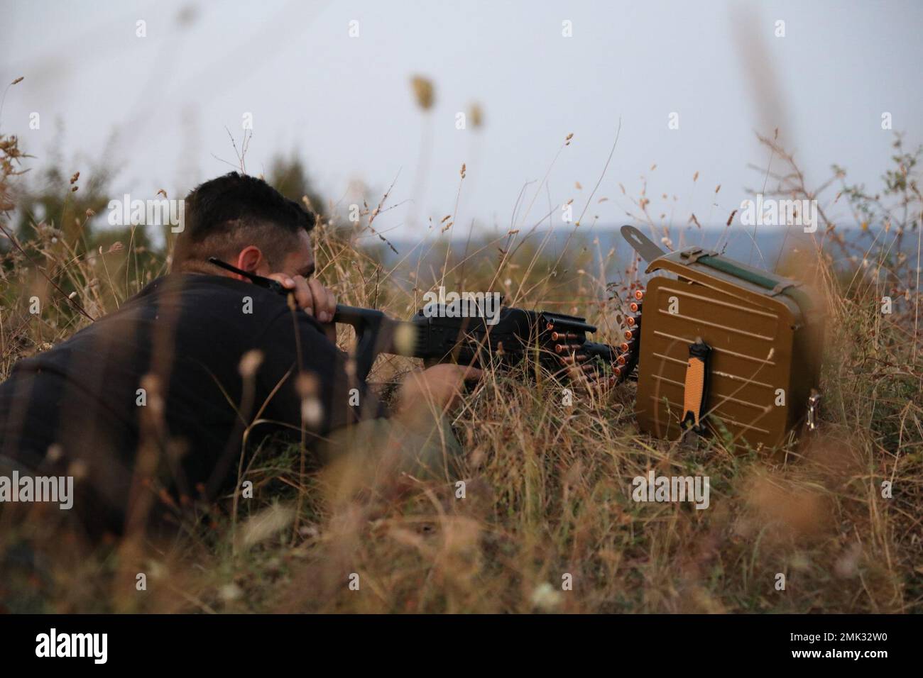 A member of Georgia’s Special Operations Forces provides security for ...