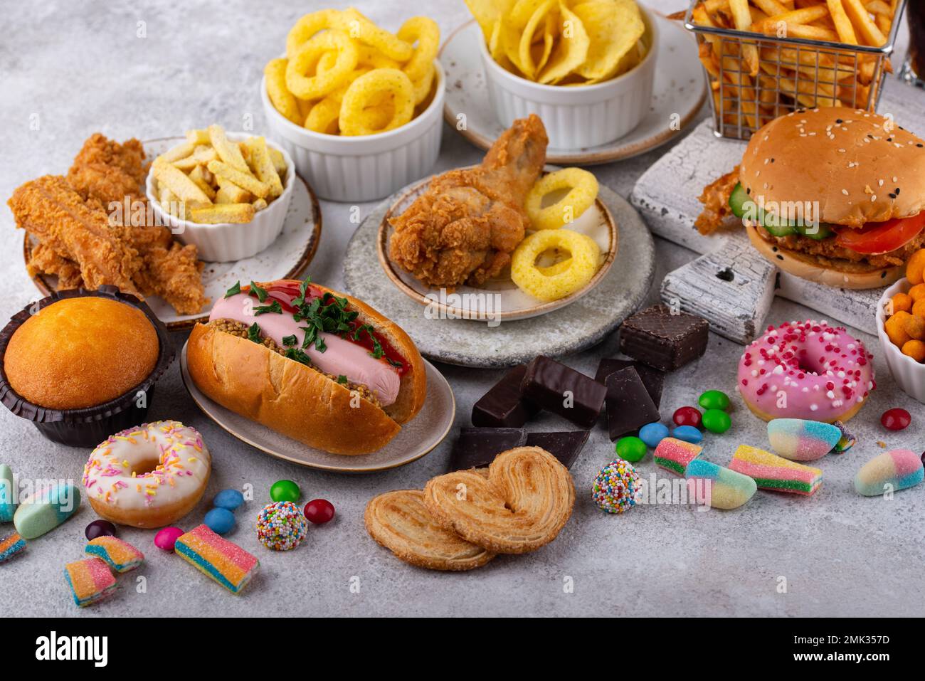 Assortment of various unhealthy junk food Stock Photo - Alamy