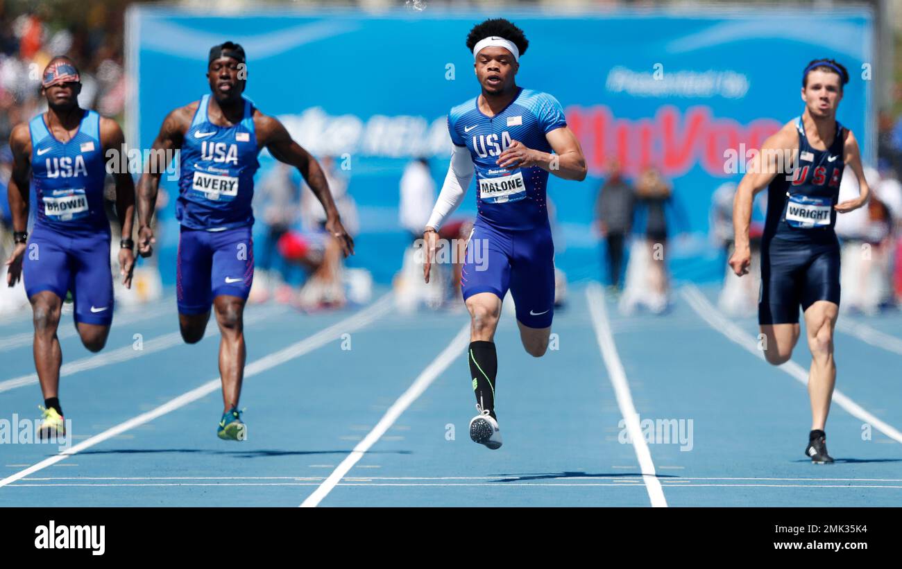 Noah Malone, center, races to the finish line while winning the ...