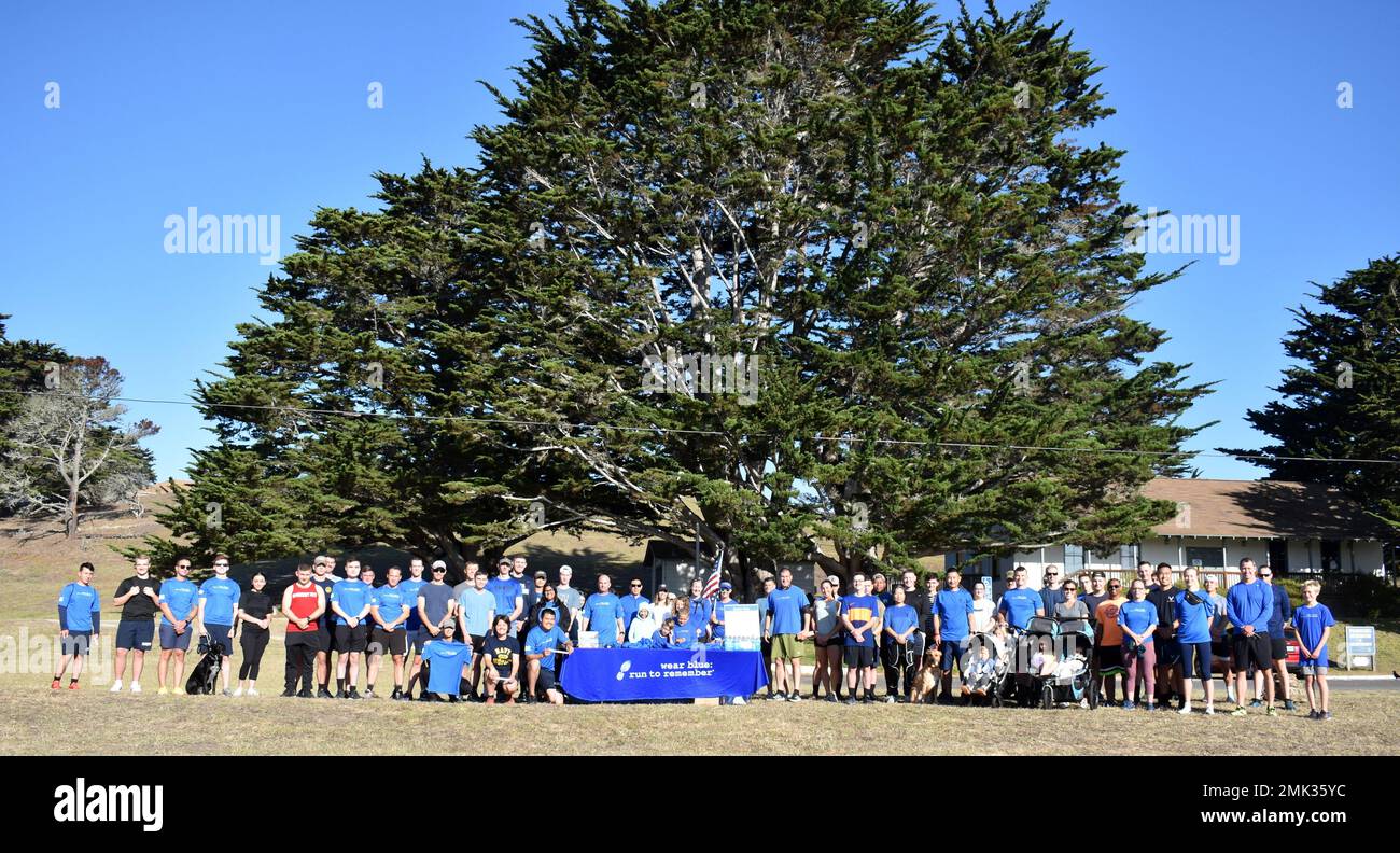 Nearly 70 members of the Presidio of Monterey community pose for a ...