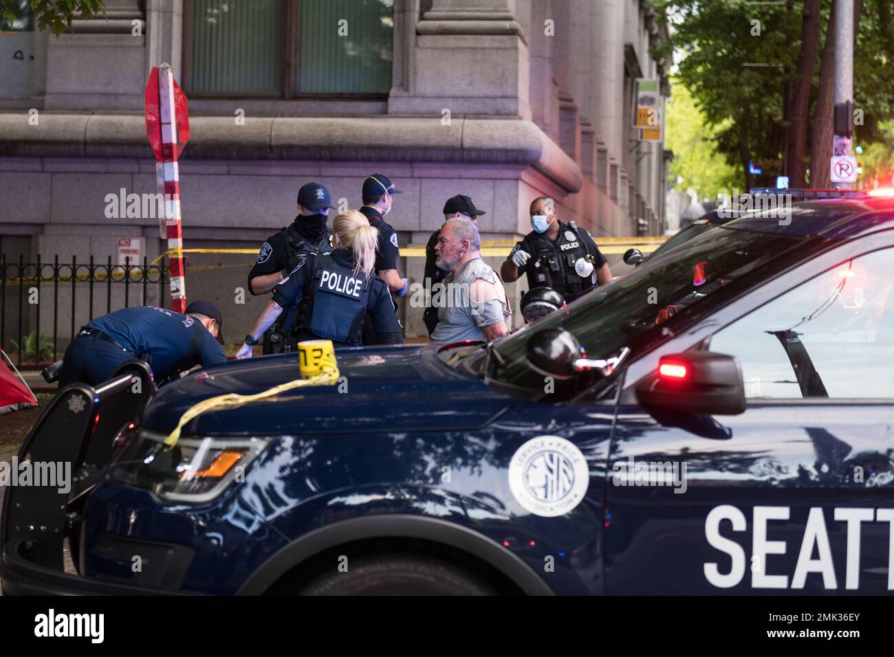 Seattle, USA. 17th Jun, 2021. Police investigating a stabbing that led ...