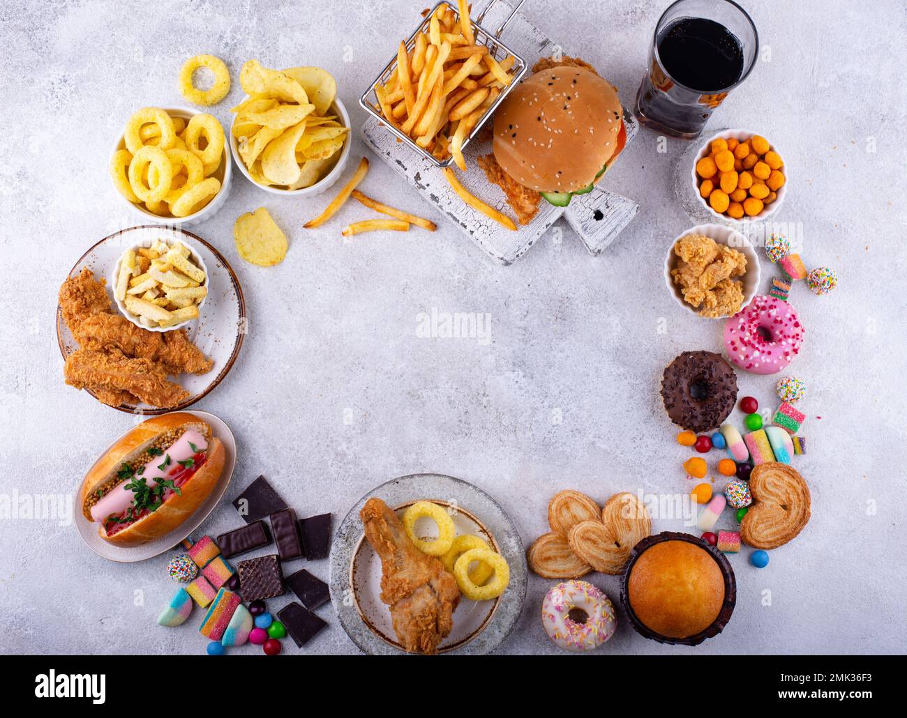 Assortment of various unhealthy junk food Stock Photo - Alamy