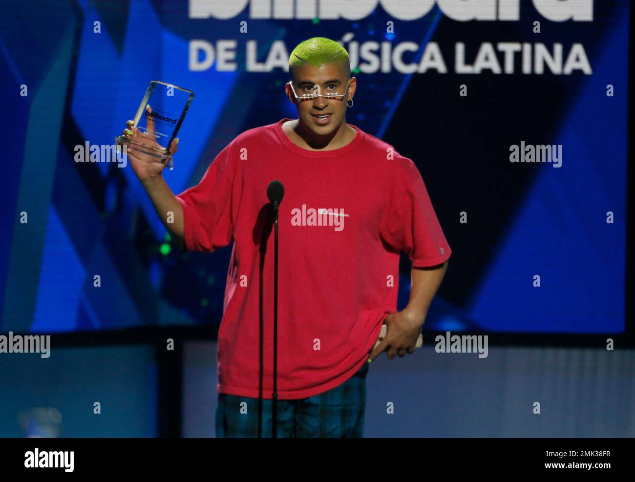 Bad Bunny accepts the award for social artist of the year at the ...