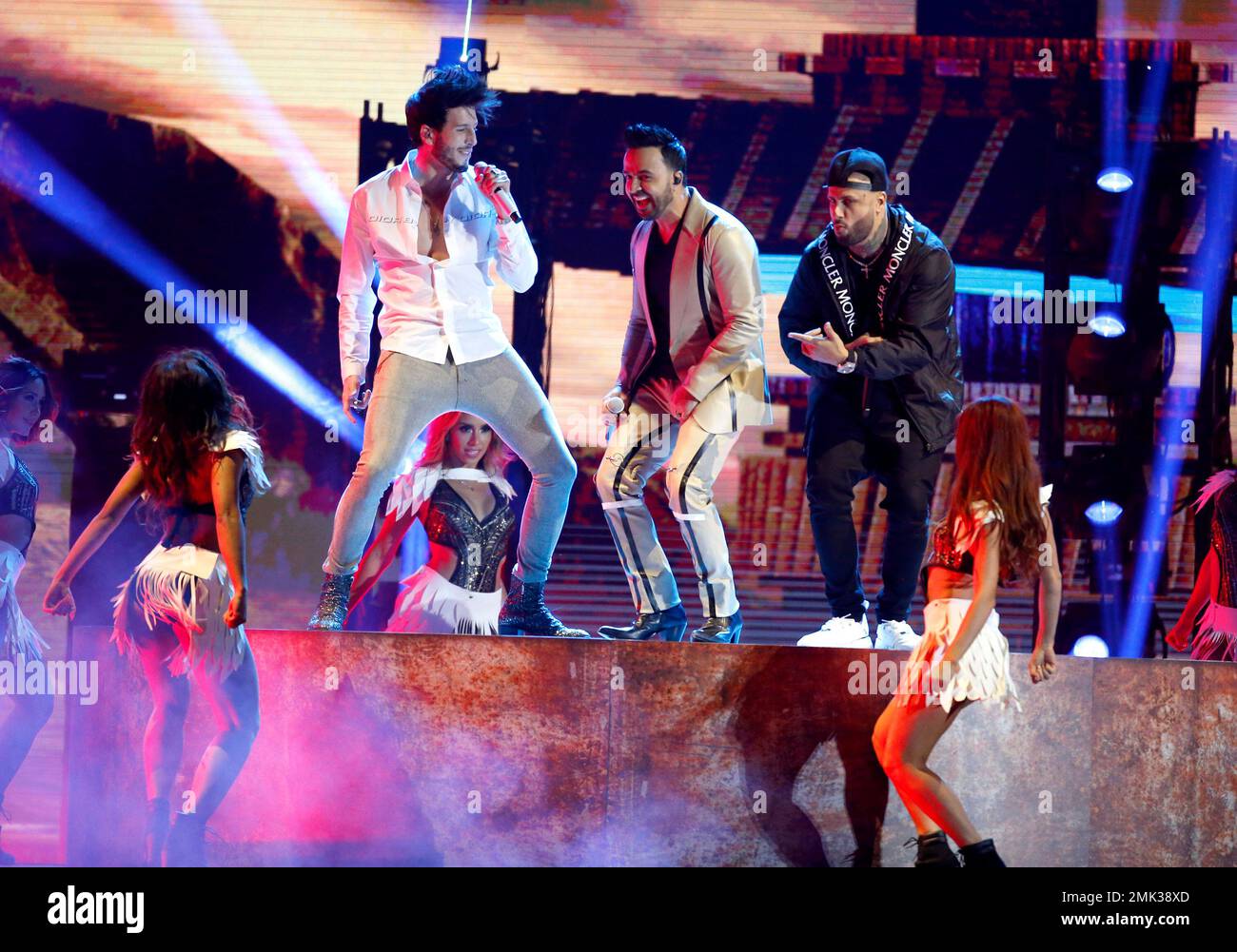 Sebastian Yatra, from left, Luis Fonsi and Nicky Jam perform "Date La ...