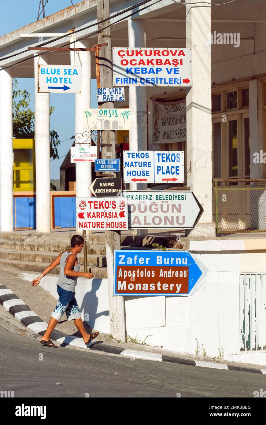 Signpost forest for tourist offer at the Karpaz peninsula Stock Photo ...