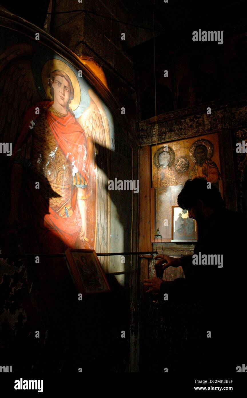 Monk with fresco at Agios Mamas church in Morfou Stock Photo - Alamy