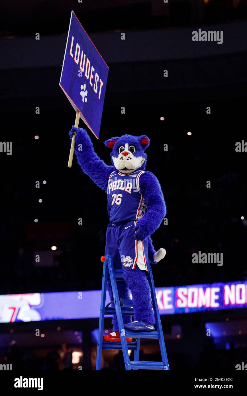 Philadelphia 76ers mascot Franklin climbs a very tall ladder to get the ...