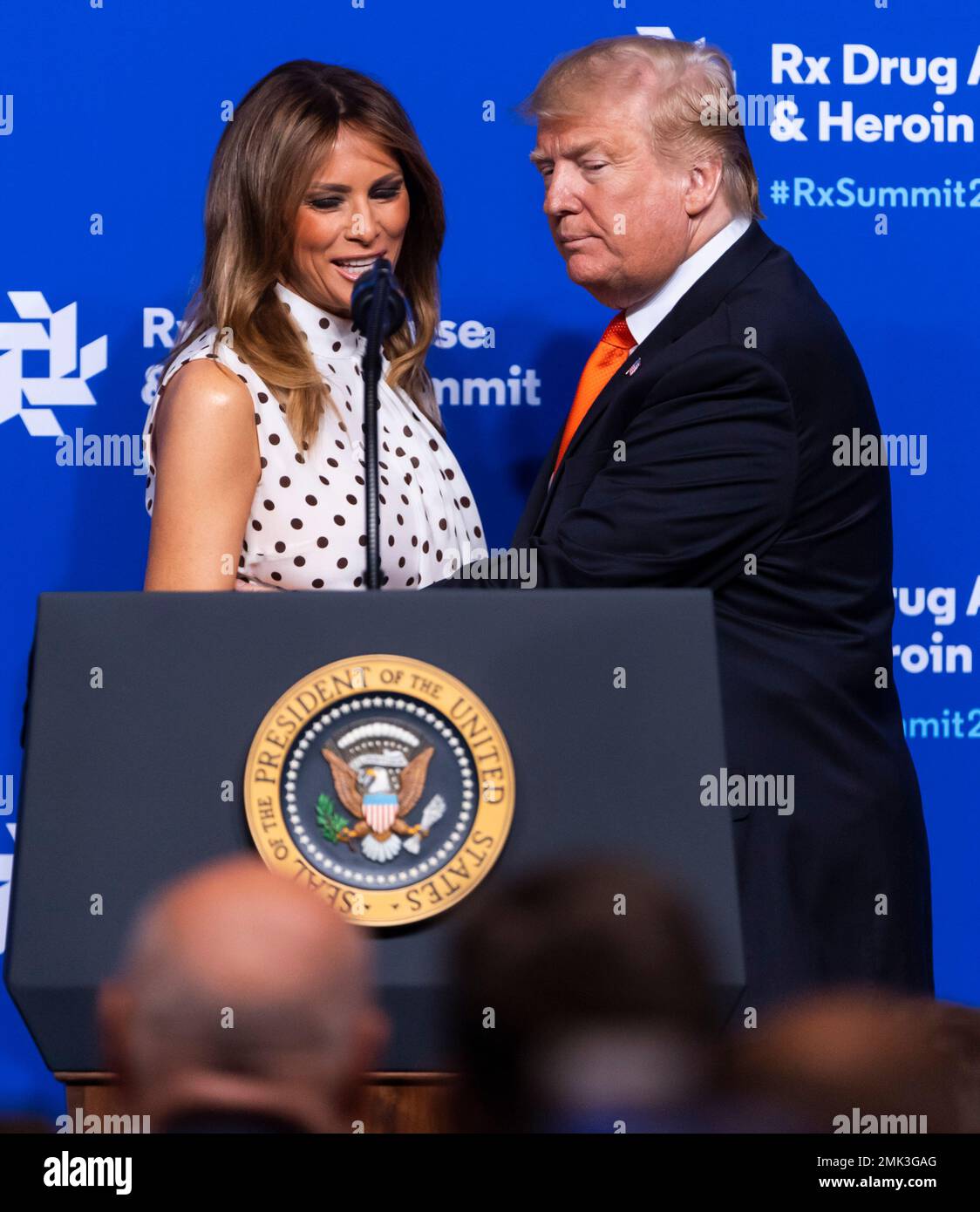 President Donald Trump takes the podium after first lady Melania Trump ...