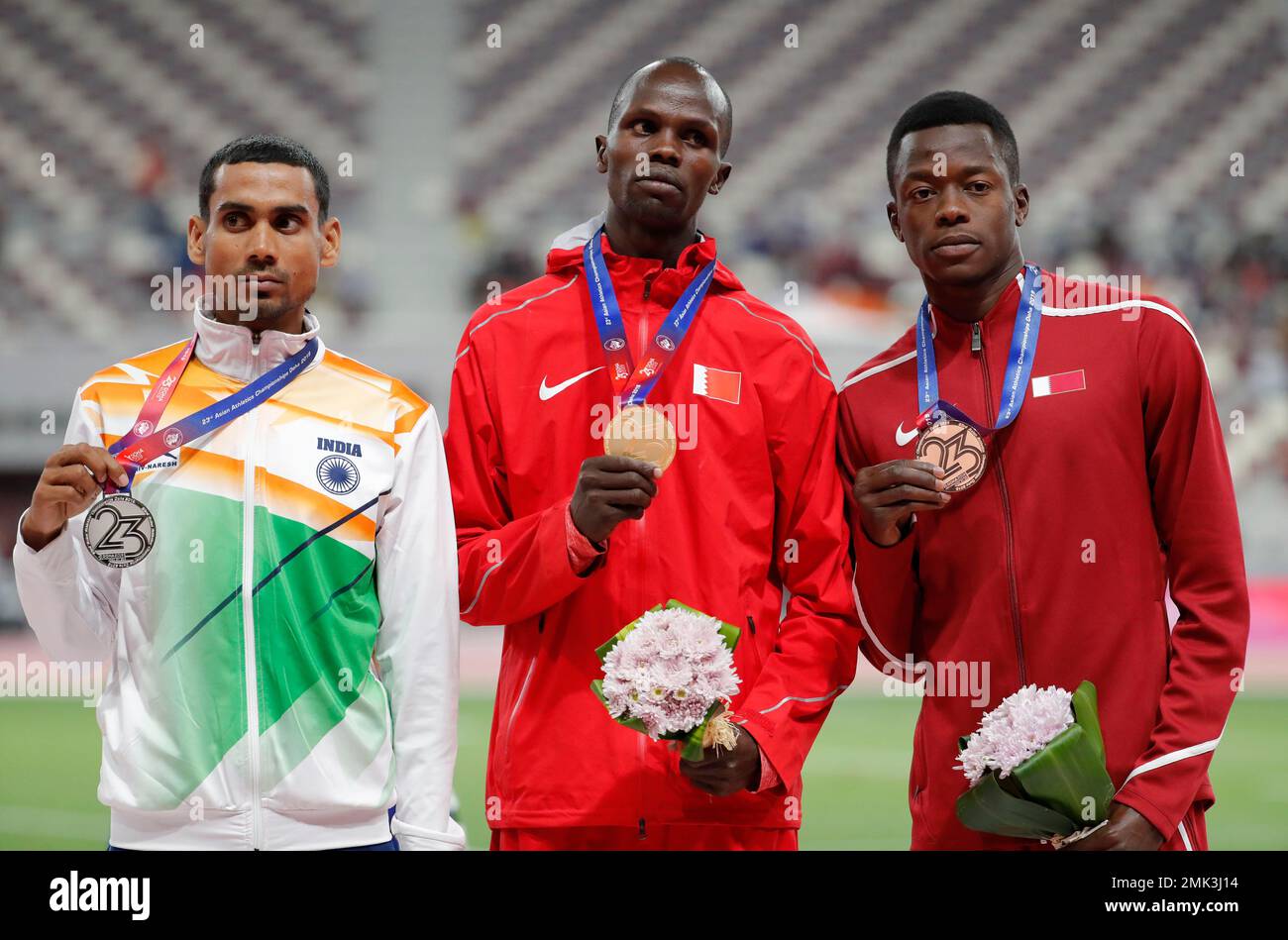 From left, India's Ajay Kumar Saroj, Bahrain's Abraham Kipchirchir ...