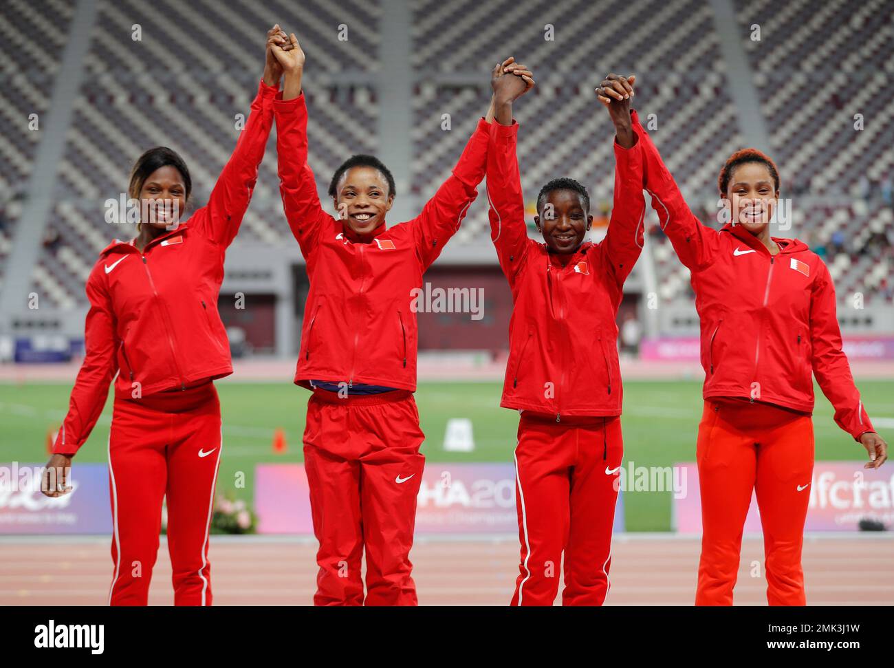Athletes from Bahrain celebrate their gold medal for the 4x400 relay at ...