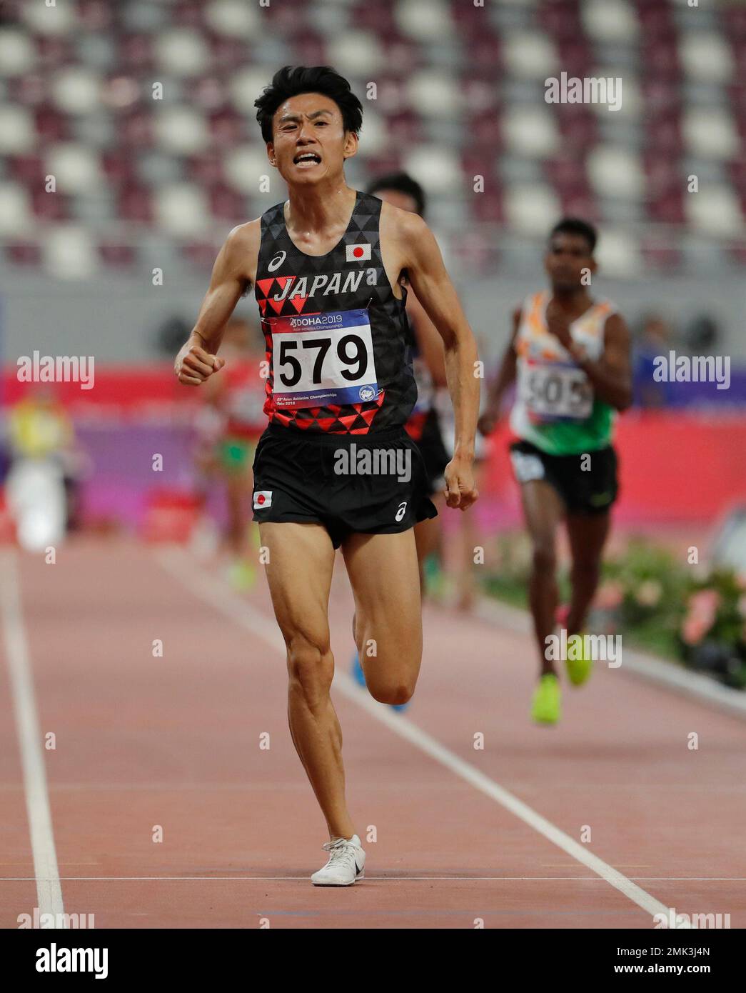 Japan's Hiroki Matsueda compete to win bronze in the men's 5000-meters race at the Asian ...
