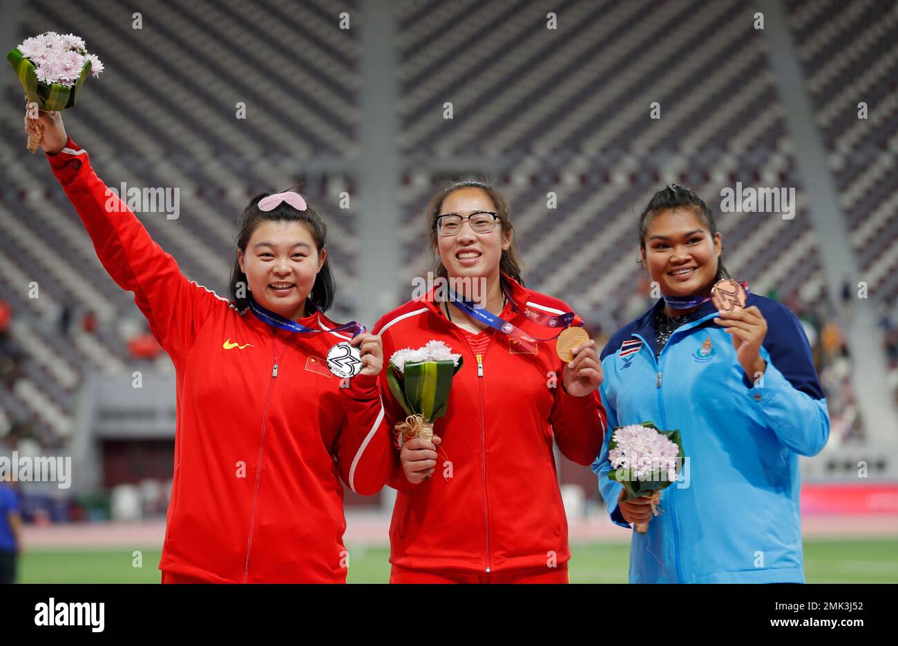 From left, China's Chen Yang, China's Feng Bin and Thailand's Subenrat Insaeng celebrate with ...