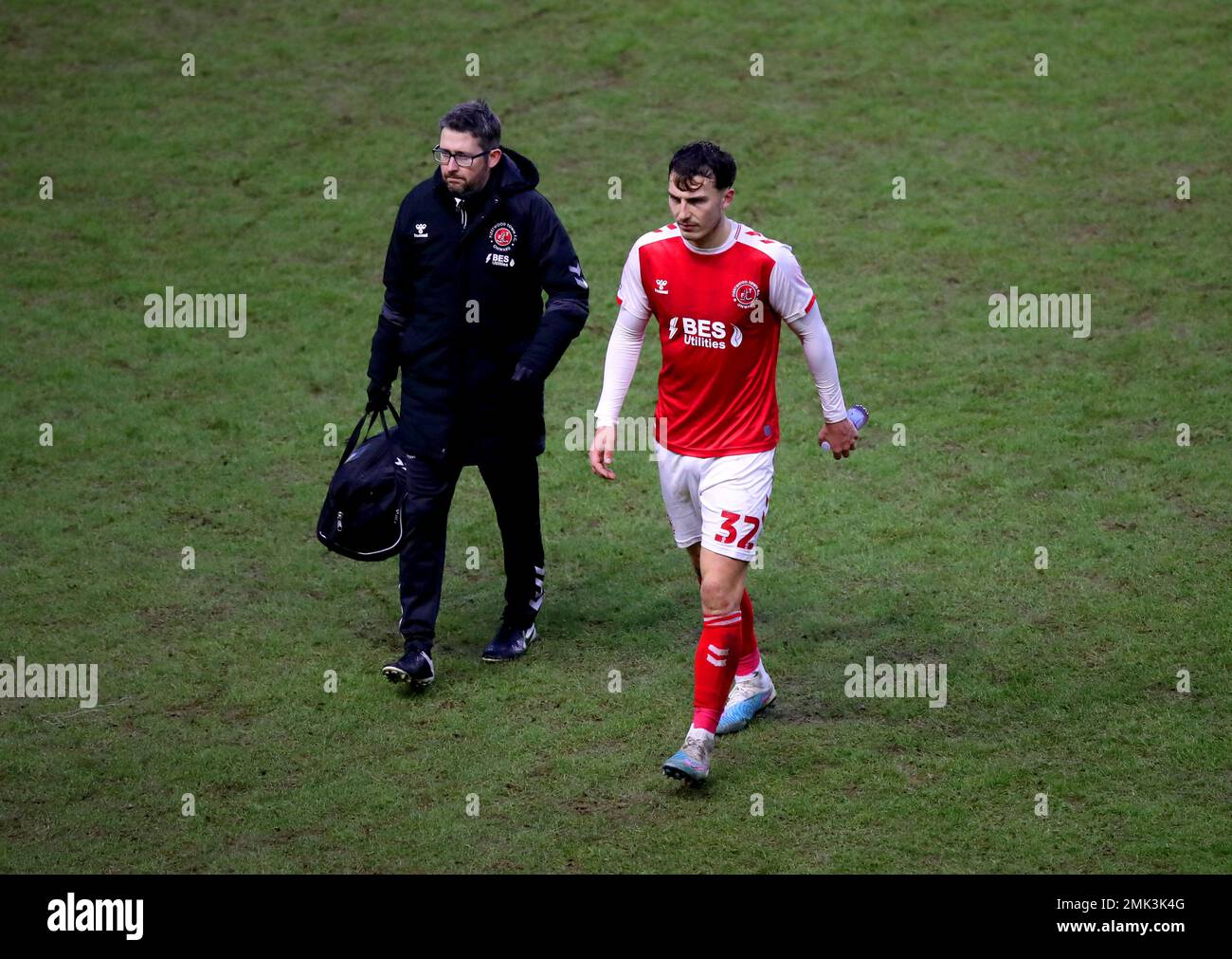 Fleetwood Town's Joshua Earl leaves the pitch after picking up an ...