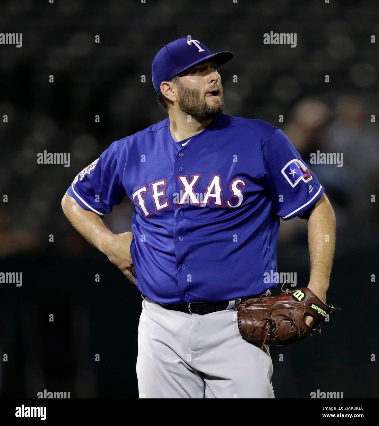 Texas Rangers pitcher Lance Lynn looks at the scoreboard in the fourth ...